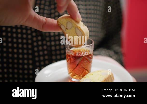 A Woman Hand Dips Biscuits Into Typical Indian Tea Juice Stock Video ...