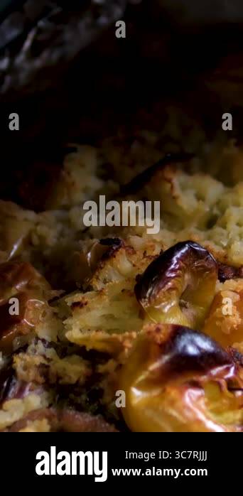 Cook sprinkles paprika on duck or goose stuffed with apples and lemon ...