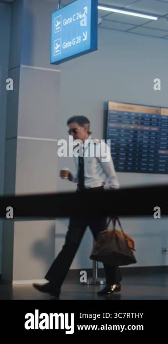 Flight Crew in Airport Terminal: Airline Captain, Two Beautiful ...