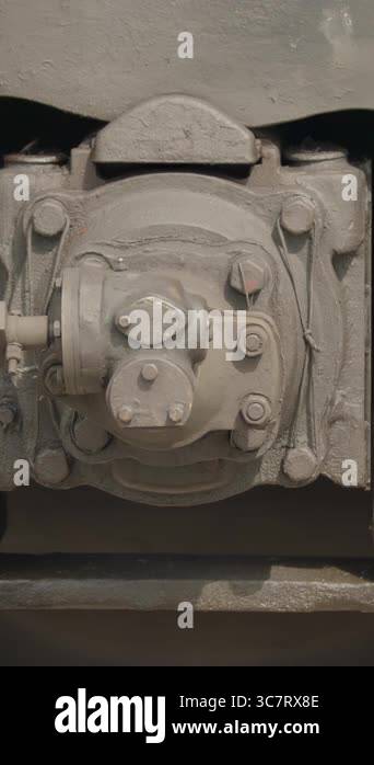 A closeup view of a highly detailed train wheel assembly that showcases ...