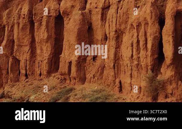 Eroded Red Rock Cliff Face in Desert Landscape video Stock Video ...