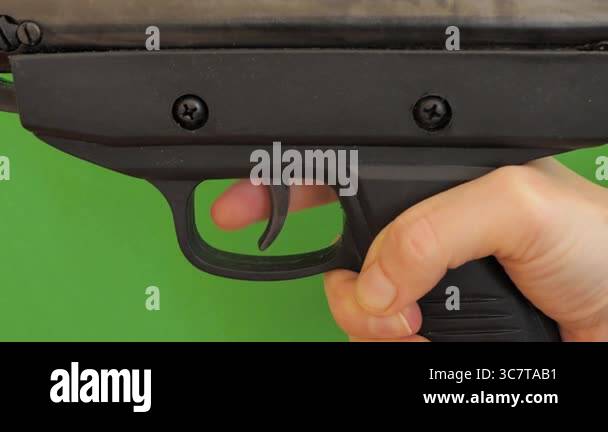 Hand firing a gun. Green screen Stock Video Footage - Alamy