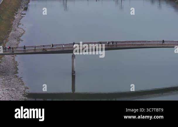 Aerial view of a pedestrian bridge in Salzburg, Austria, with people ...