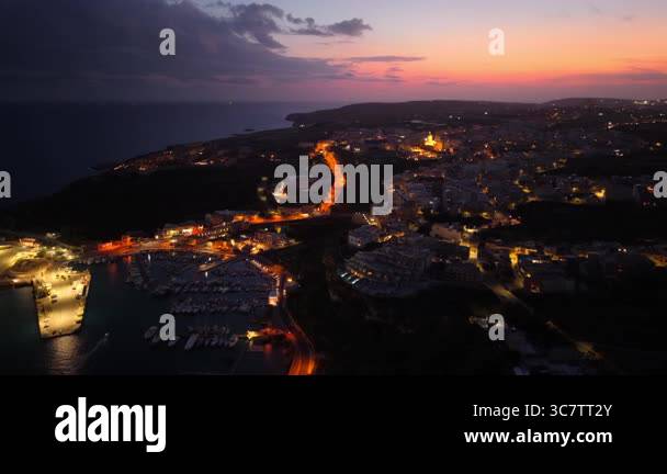 Experience the captivating aerial view of Malta as dusk settles. The ...