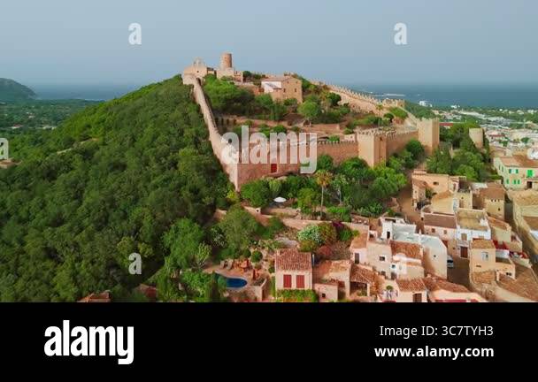Aerial view of the medieval Castle of Capdepera on the hill above the ...