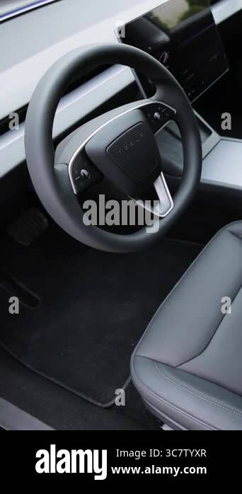 Vertical Video of Steering wheel, Tesla electric car model 3 Interior ...