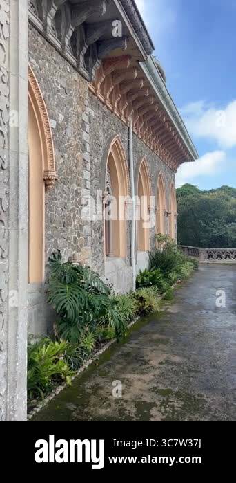 Side view of the romantic Monserrate Palace in Sintra, Portugal. Arched ...