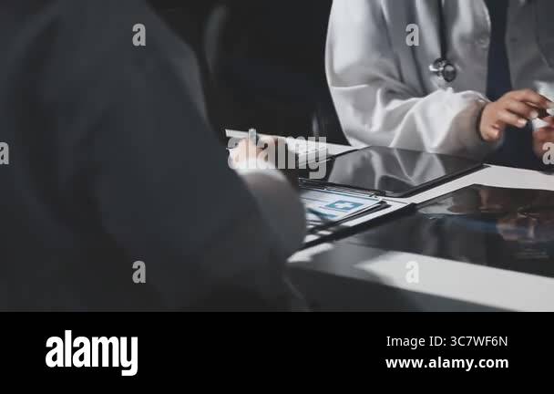 doctors discussing medical issues in the hospital Stock Video Footage ...