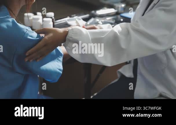 professional doctor working in hospital office and patient. healthcare ...