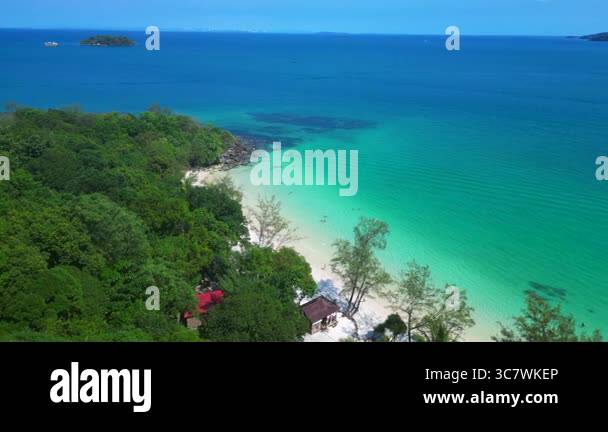 Aerial view of tourists enjoying the white sand Kaoh Touch Beach and ...