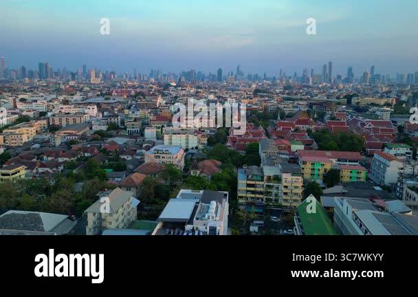 Aerial view of Bangkok urban skyline showing rooftops and skyscrapers ...