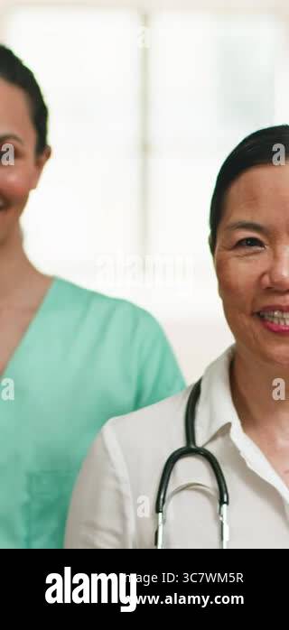 Portrait of happy and confident medical team standing together in ...
