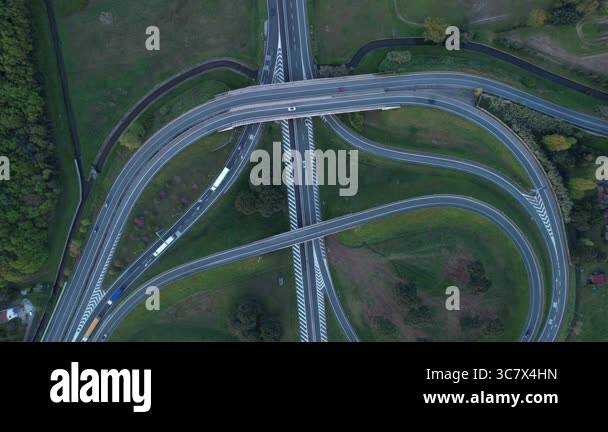 Detailed aerial video documentation of a complex highway junction with ...