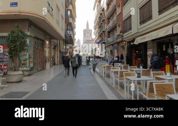 VALENCIA, SPAIN - FEBRUARY 6, 2019: people walking through the lively ...