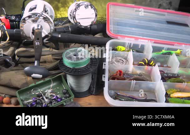 Fishing tackle, slowly moving in a horizontal plane, laid out on a ...