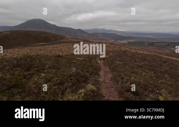 Scottish hillwalking in the mountains of Perthshire. Wide open Scotland wilderness open rolling ...