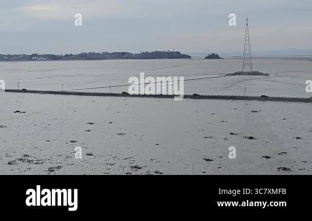 Foggy Seaside Drive Through the Mudflats Stock Video Footage - Alamy