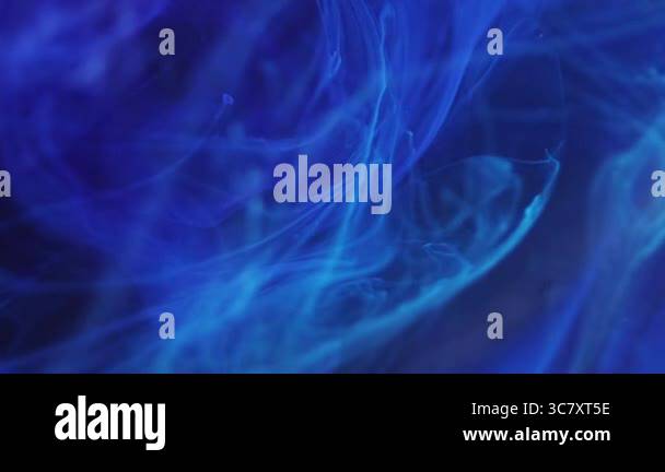 Mist magic. Floating blow. Defocused bright blue splash paint ink cloud ...