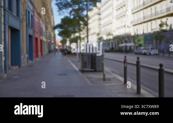 Blurred street view in marseilles featuring colorful buildings ...