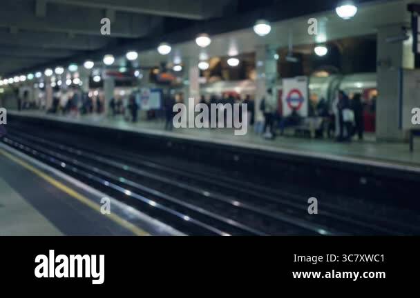 Blurry view of subway platform with crowd out of focus, defocused ...