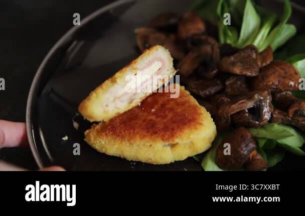 Meat cutlet Cordon Bleu chicken, ham, cheese appetizer dish fresh ...