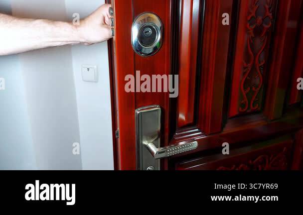 Effortless elegance meets security-unlocking a sturdy wooden door with ...
