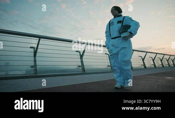 Female Astronaut in Space Suit Confidently Walking on Mars. Hispanic ...
