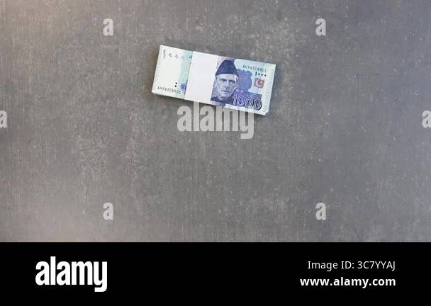 Pakistan currency note bundles of 1000, 100 and 50 rupees Stock Video ...