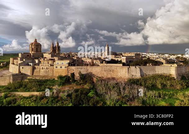 Experience the breathtaking aerial view of Mdina, a fortified city in ...