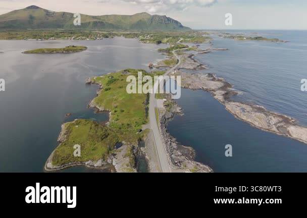 Explore the breathtaking coastline of Norway featuring lush greenery ...