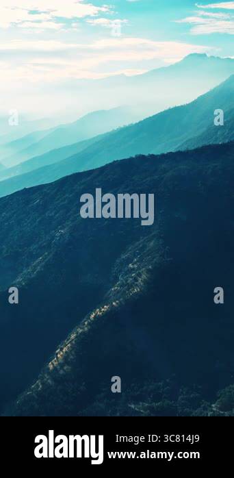 Gorgeous mountain ranges covered with greenery. Beautiful rocks in the ...