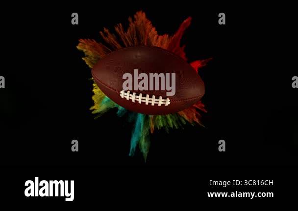 Super Slow Motion of Falling American Football Ball with Colored Powder ...