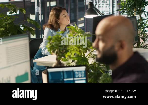 Startup staff member working to hit key performance targets for revenue ...