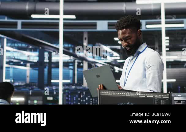 Data center engineer doing node tree programming to optimize resource allocation. Server farm ...