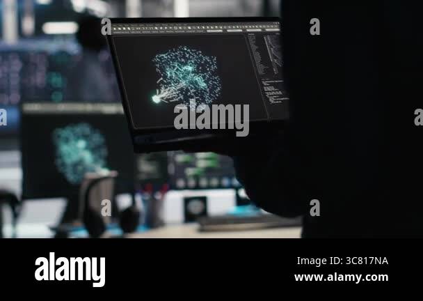 Server hub technician arriving in office, using AI visualization insights on PC to optimize ...