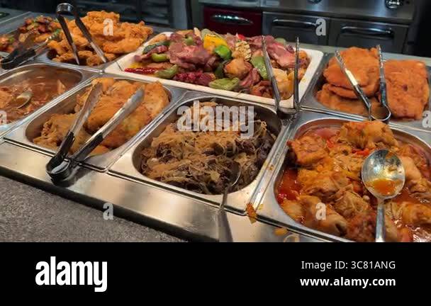 Catering buffet food. Delicious colorful meat and vegetable dishes on ...