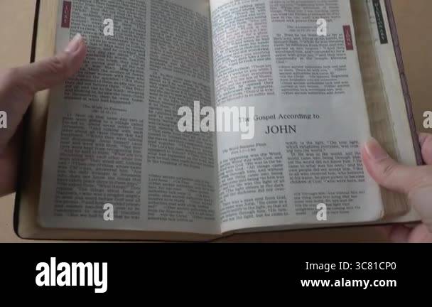 The book of John in the New Testament of the Holy Bible Stock Video ...