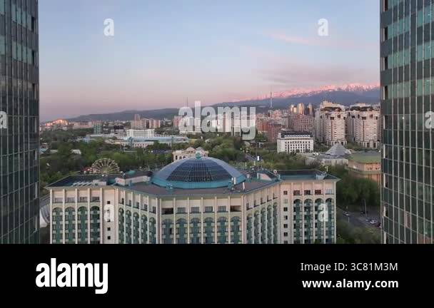 Almaty, Kazakhstan, 04.20.2025. View from a quadcopter on high-rise ...