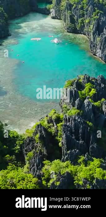 Turquoise Lagoons with boat and kayak in Miniloc Island. El Nido ...