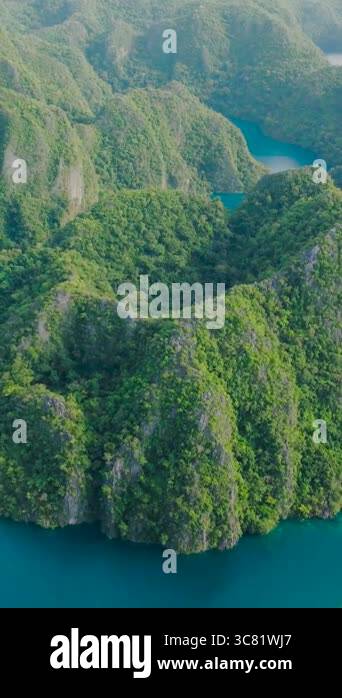 Aerial view of mountain lakes with limestone rocks. Kayangan Lake ...