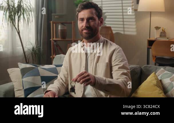 Smiling Caucasian guy man middle-aged male homeowner holding keys new ...