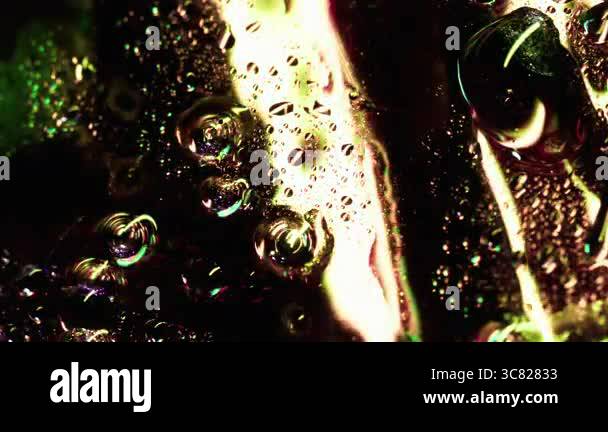 Wet glass. Color condense. Illuminated shiny area covered with flowing ...