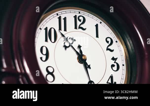 Close-up timelapse video shows the black ornate hands of a vintage ...