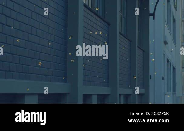 Floating stars animation illuminating dark blue brick building exterior ...