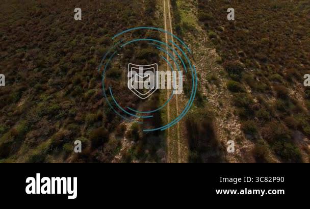 Email security icon animation over aerial view of rural landscape ...