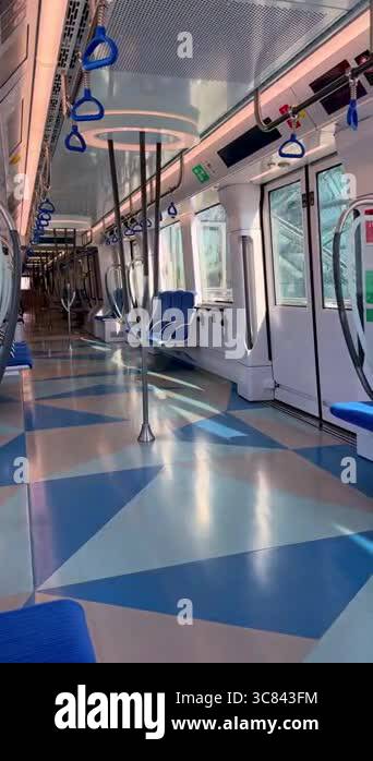 Inside view of modern Dubai metro train. The clean and empty metro ...
