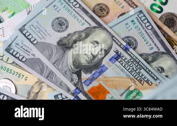 Closeup and detailed view of US hundred dollar banknotes highlighting ...