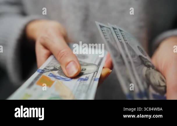 Woman counting US Dollar bills, close-up. Concept of investment ...