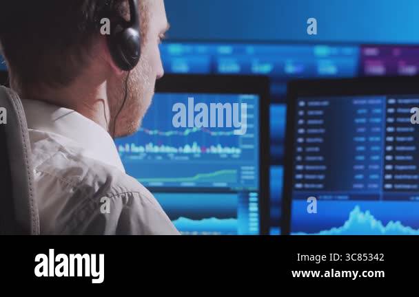 Trader works in office using workstation and analysis technology ...