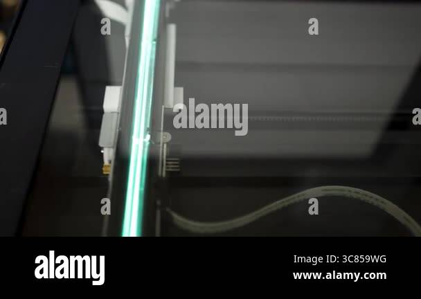 The scanning head of the office scanner performs the scanning process ...